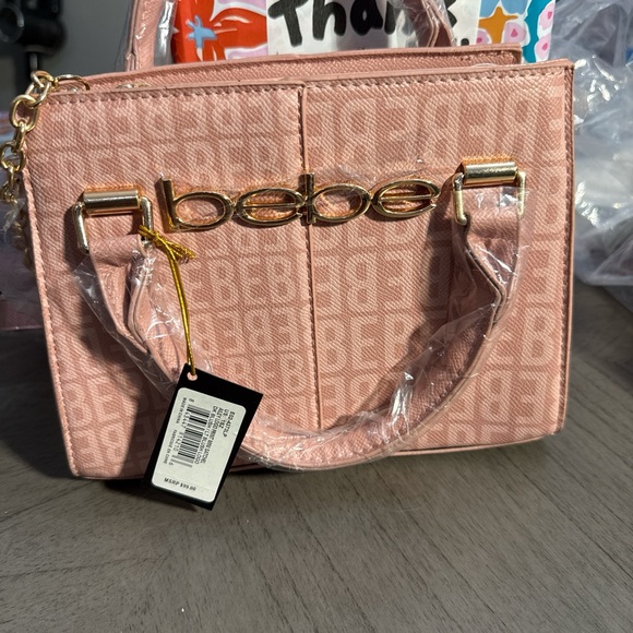 bebe | Bags | Bebe Gold Logo Mini Bag In Pink | Poshmark